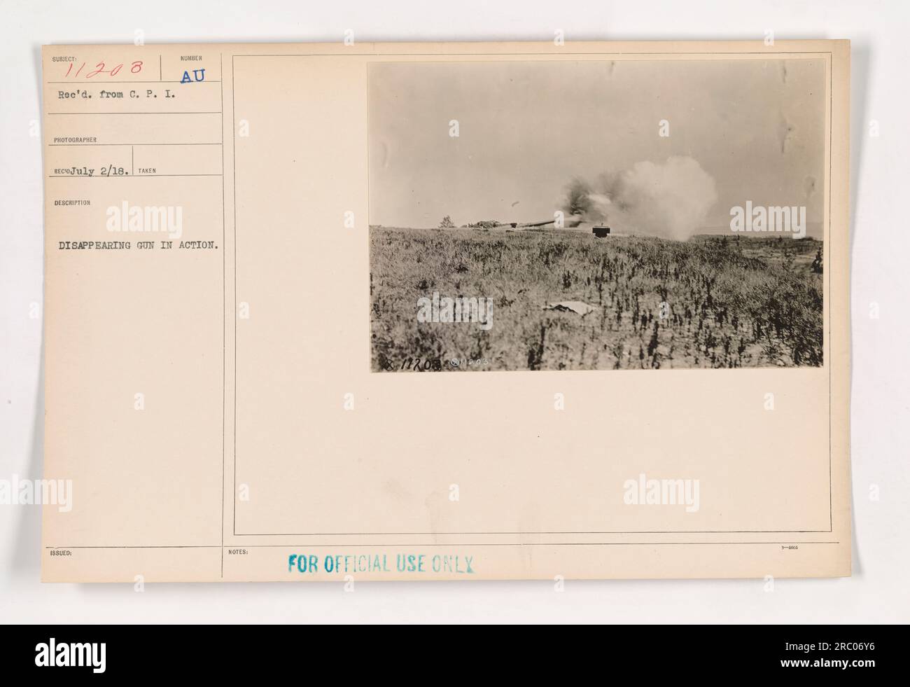 "American soldiers operating a disappearing gun in action during World ...