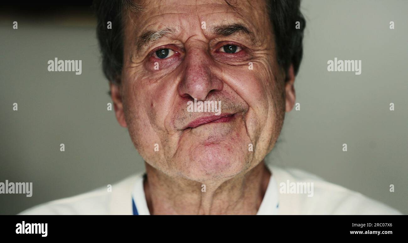 Older man suffering from depression portrait face closeup Stock Photo ...