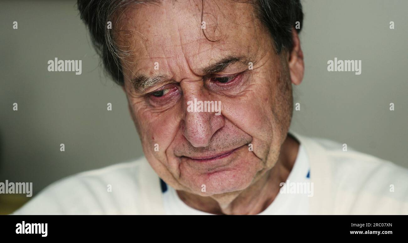 Older man suffering from depression portrait face closeup Stock Photo ...