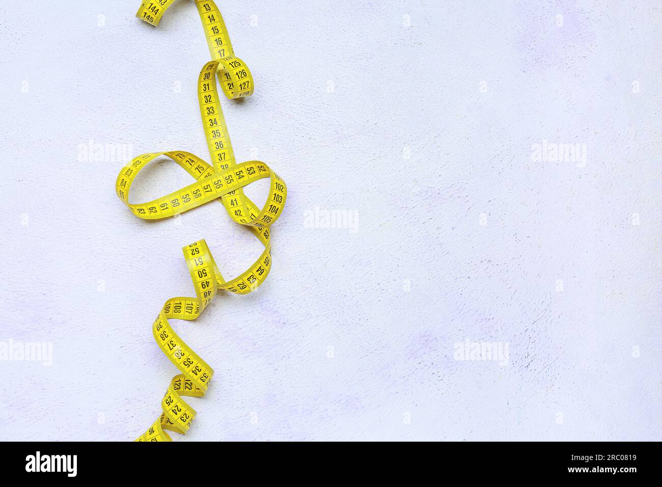 New yellow measuring tape hi-res stock photography and images - Alamy