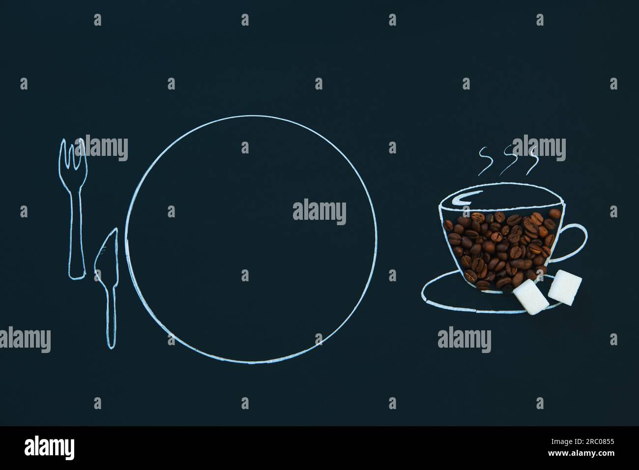 Cup of coffee, plate, fork and knife are drawn with chalk on a black ...