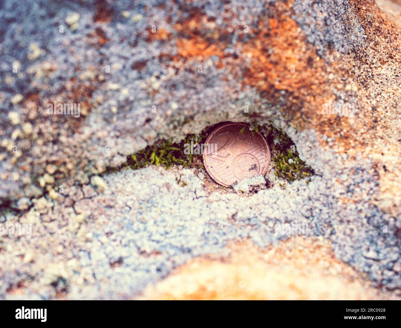 Coin in cave wall hi-res stock photography and images - Alamy