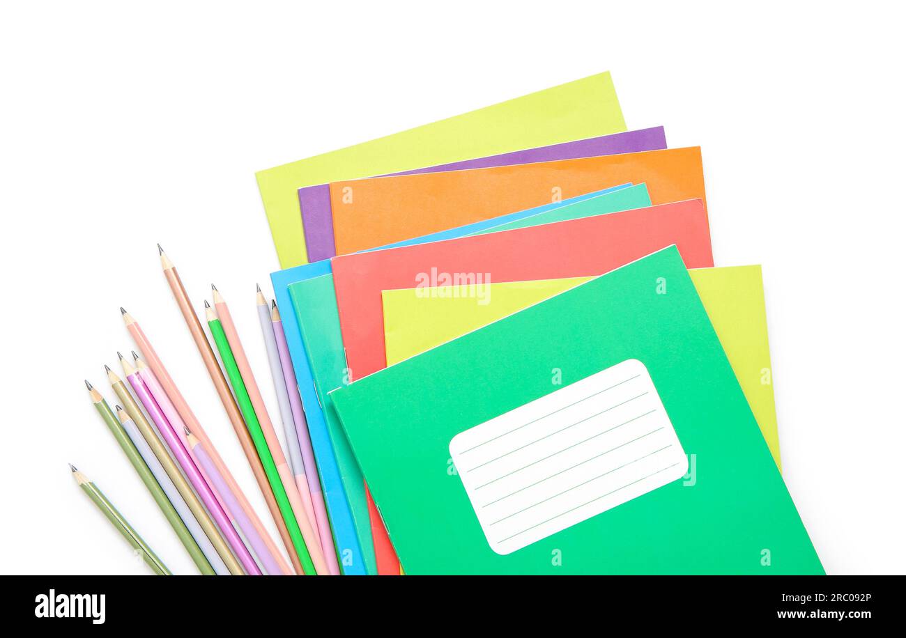 Different colorful notebooks with pencils isolated on white background ...