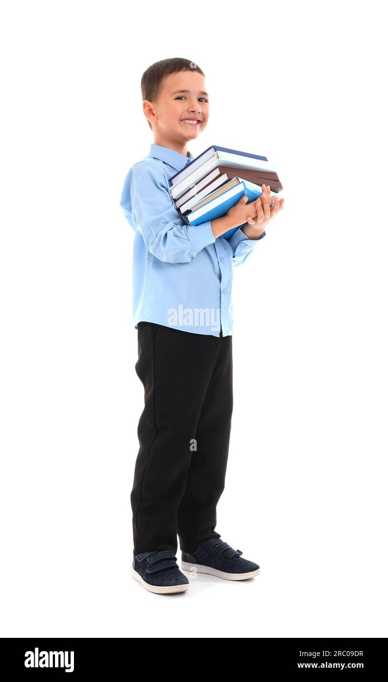 Little schoolboy with books on white background Stock Photo - Alamy
