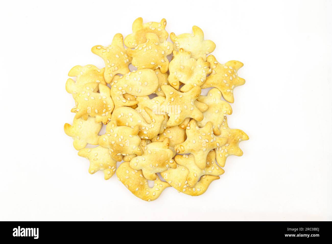 Group of sea creatures shaped crackers with sesame seeds isolated on ...