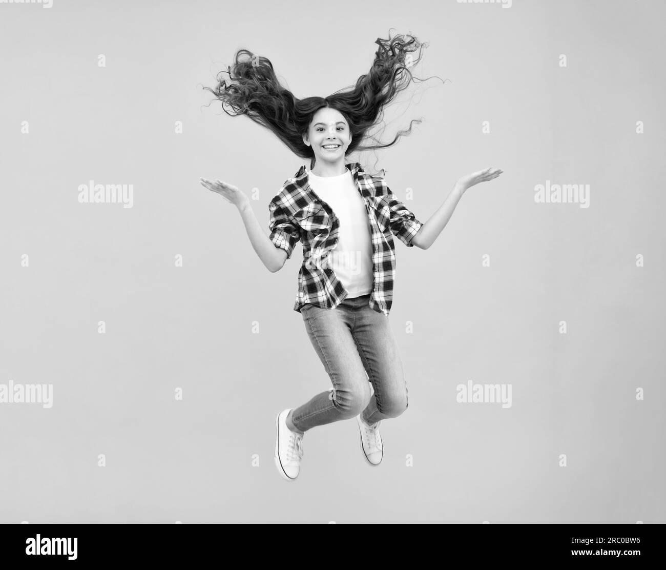 Teenager face with crazy movement hair. Happiness, freedom, motion and ...