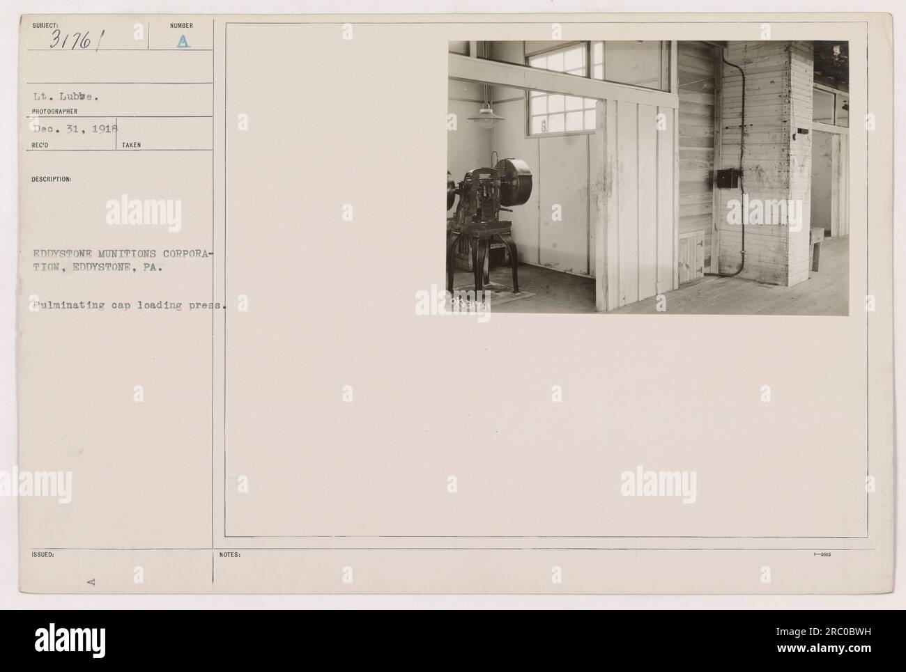 Image captures Lt. Lubbe operating a fulminating cap loading press at ...