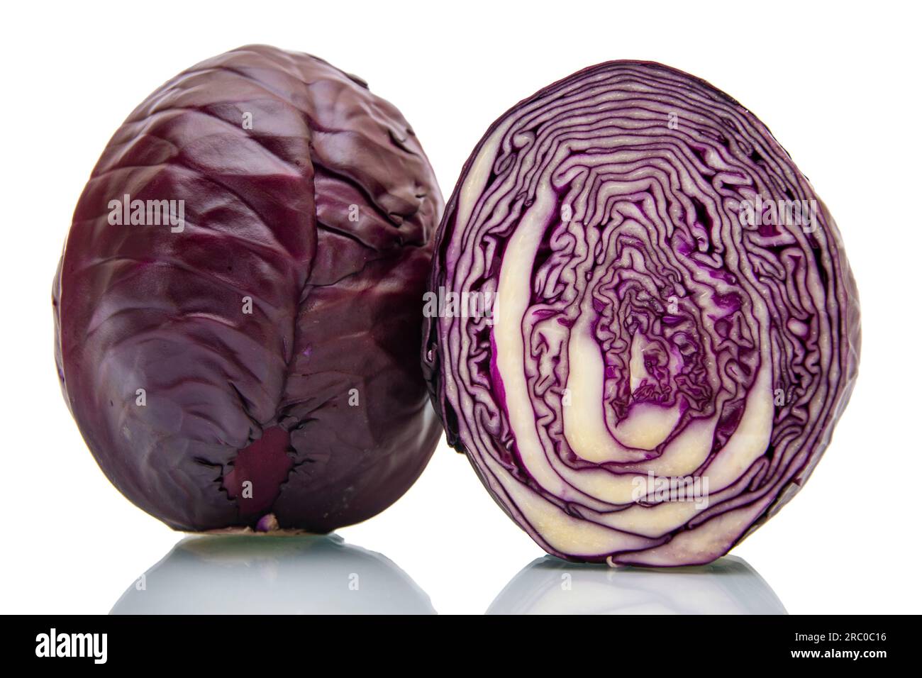 Red cabbage cut in half on a white isolated background Stock Photo - Alamy