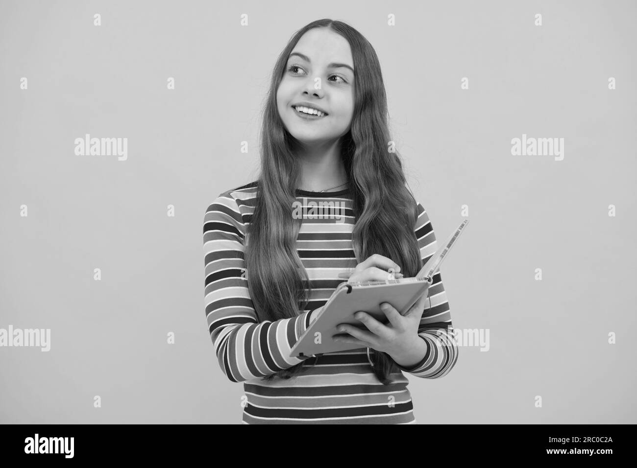Yellow notebooks Black and White Stock Photos & Images - Alamy