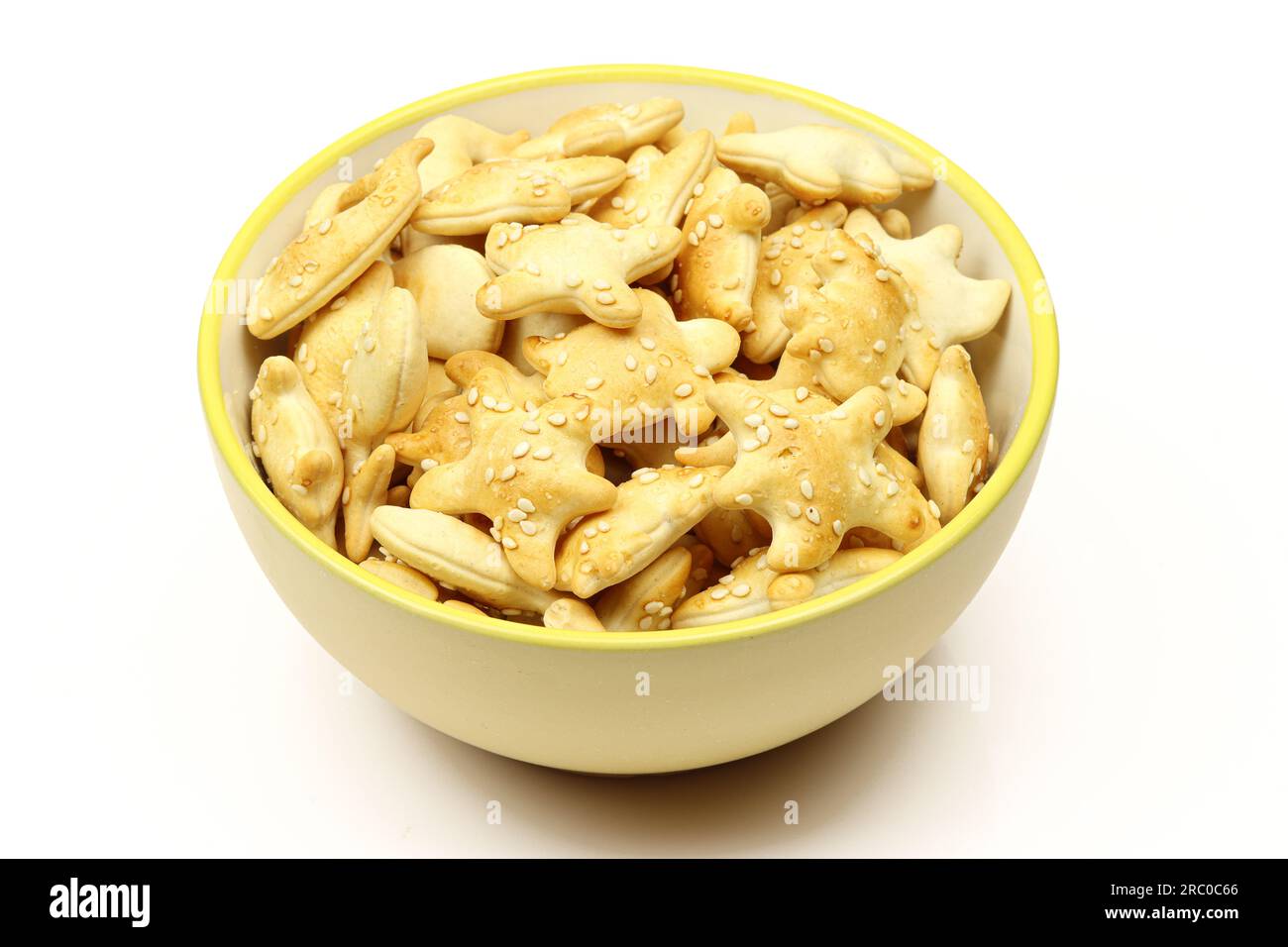 Bowl full of sea creatures shaped cracker appetizers with sesame ...