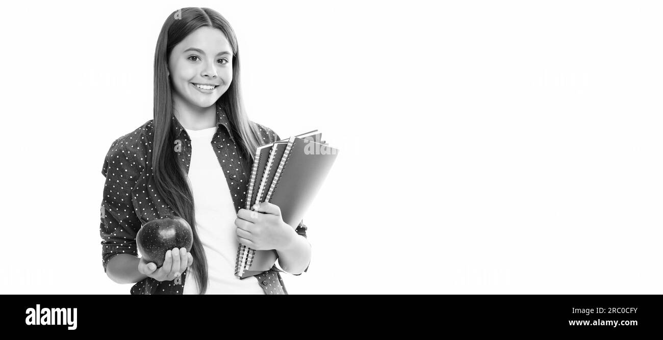 smiling teen girl with notebook. back to school. child with apple ready ...
