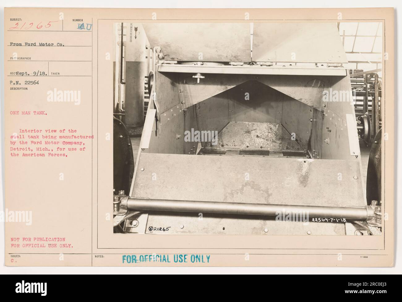 This photograph shows an interior view of a small tank being ...