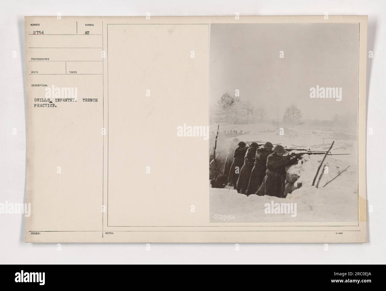 Soldiers participating in trench drills for infantry. This photograph, numbered 2754, captures a ...