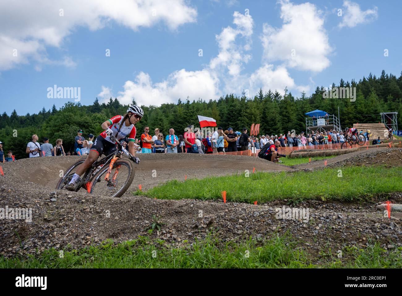 Portugese rider Raquel Queiros takes a turn with berms - 2023 UEC MTB ...