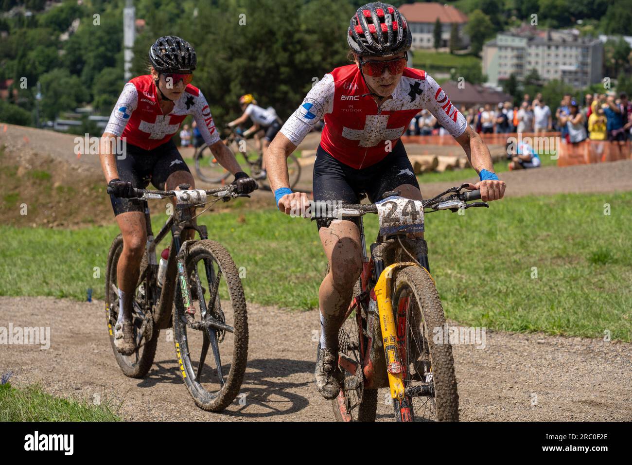 Two Swiss riders Steffi Haberlin and Nicole Koller on gravel uphill ...