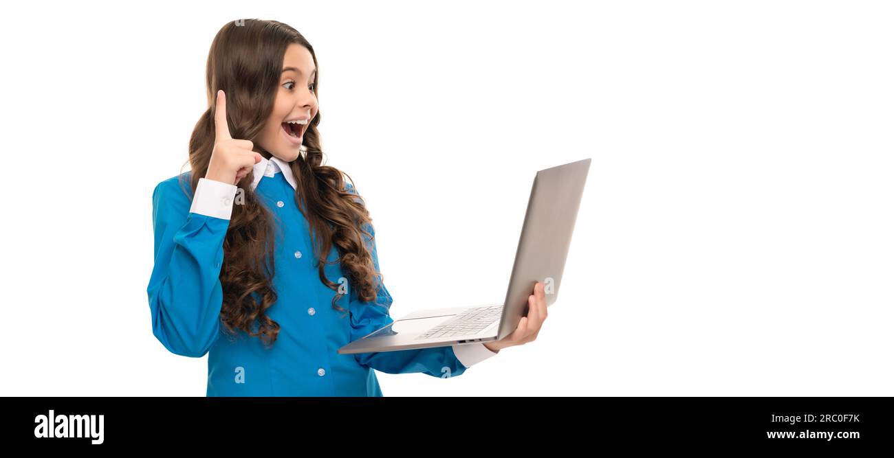 amazed face of teen girl hold computer inspired with idea isolated on ...