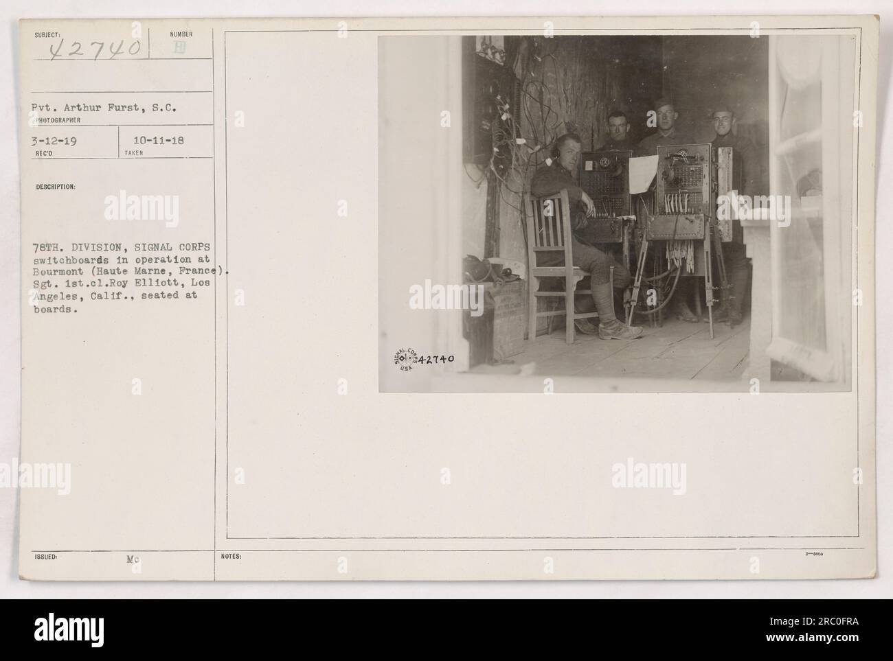 Pvt. Arthur Furst, S.C., photographed switchboards in operation at ...