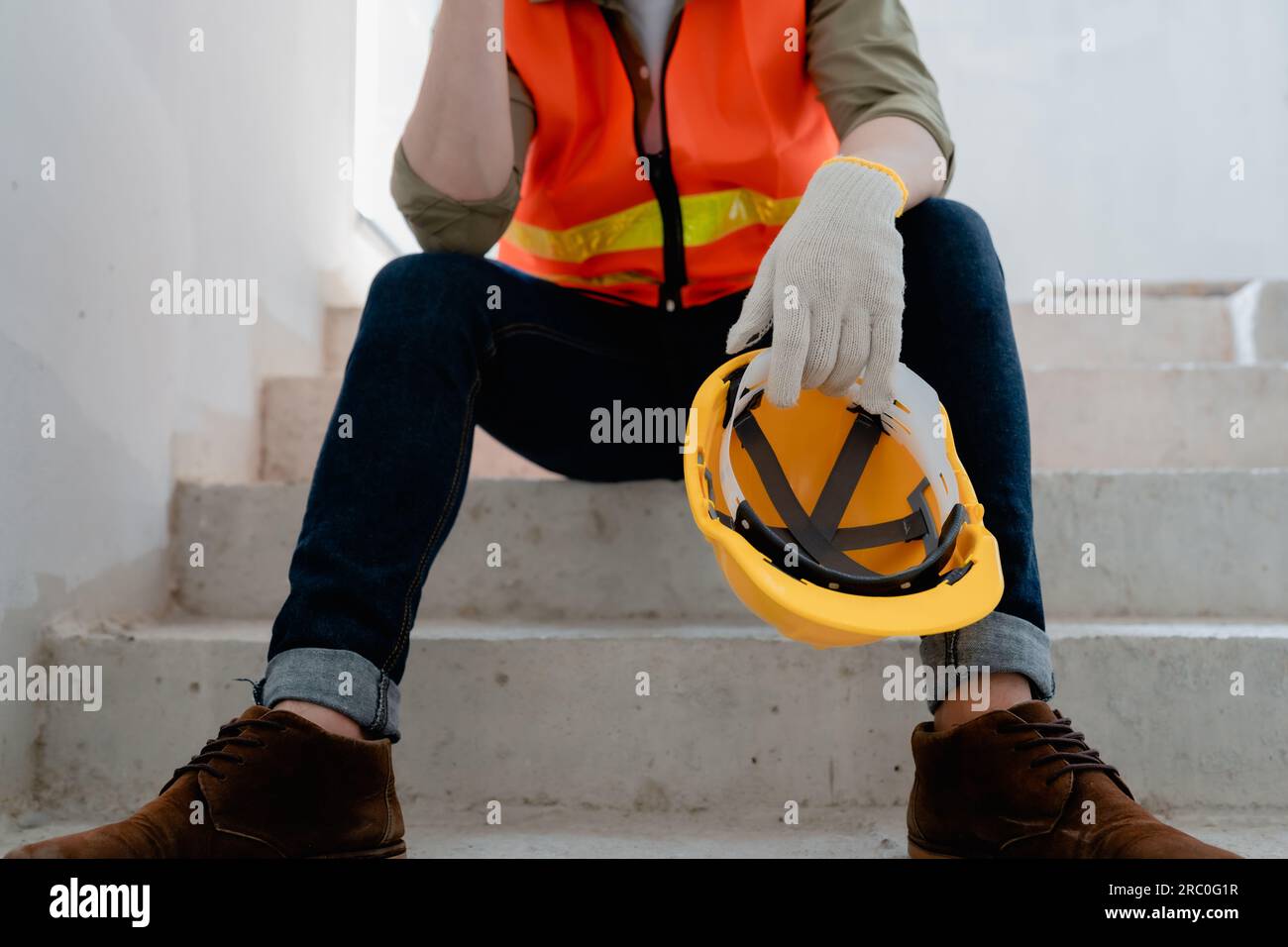 Engineers or architects show signs of exhaustion and discouragement ...