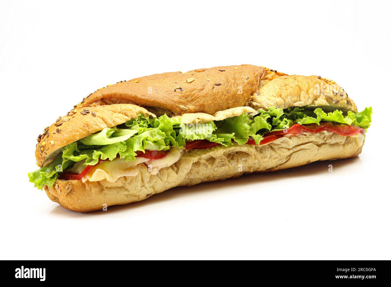 Prepared sandwich with lettuce,cheese and prosciutto isolated on white ...