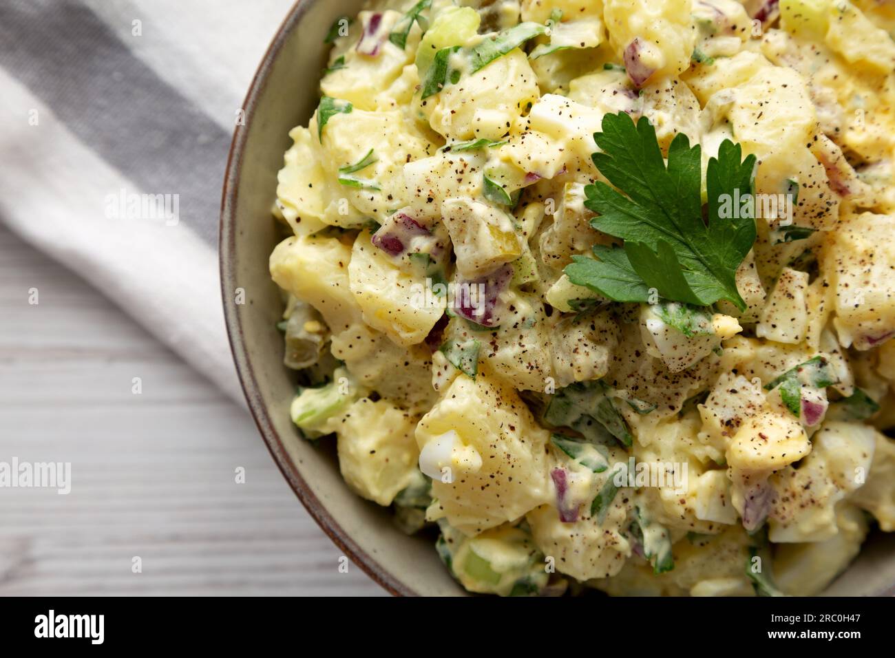 Homemade Potato Egg Salad with Pickles in a Bowl, top view. Flat lay ...