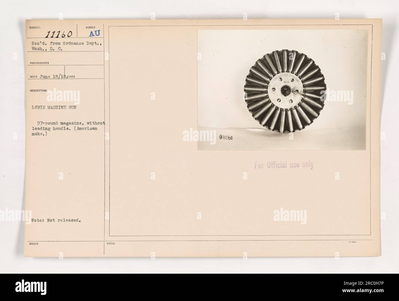 Soldiers training with Lewis machine gun during World War One. Gun has ...