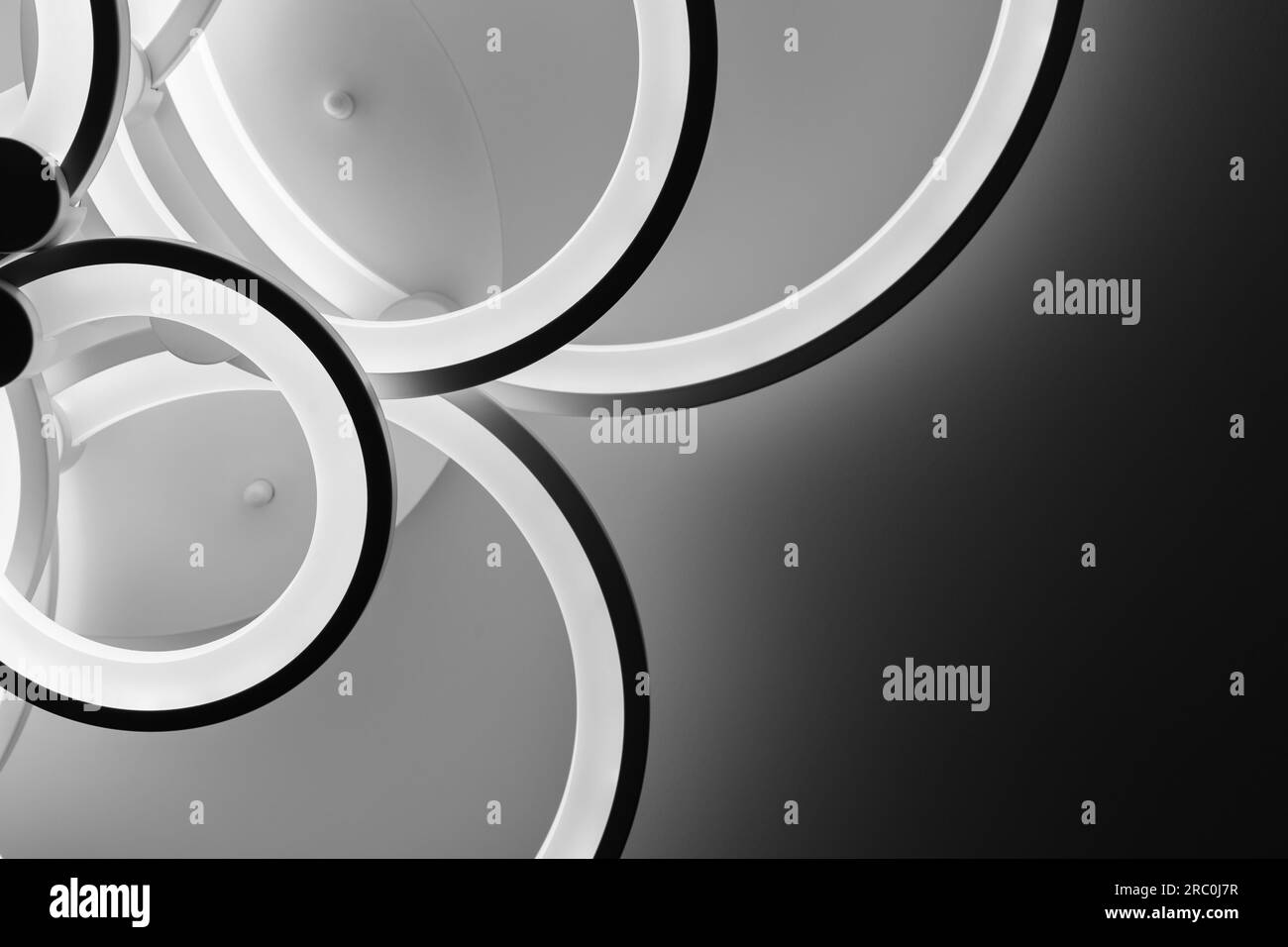 Luminous modern LED ring lamp on the ceiling. Bottom view Stock Photo ...