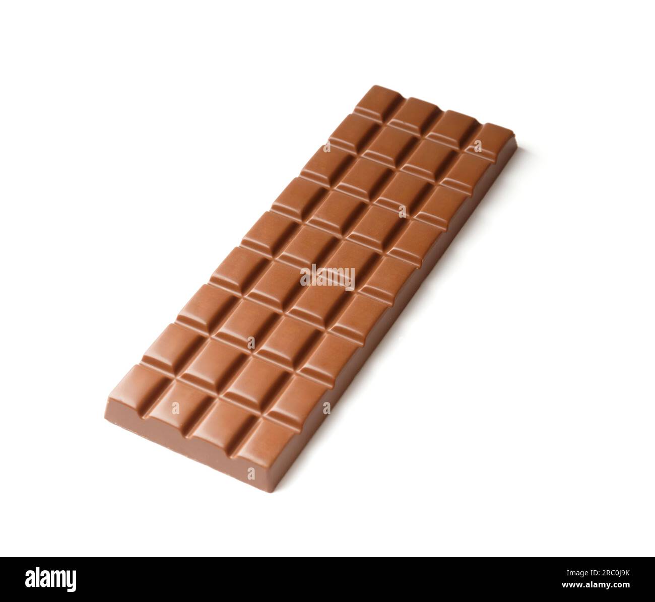 Large whole bar of milk chocolate with nuts on a white background ...