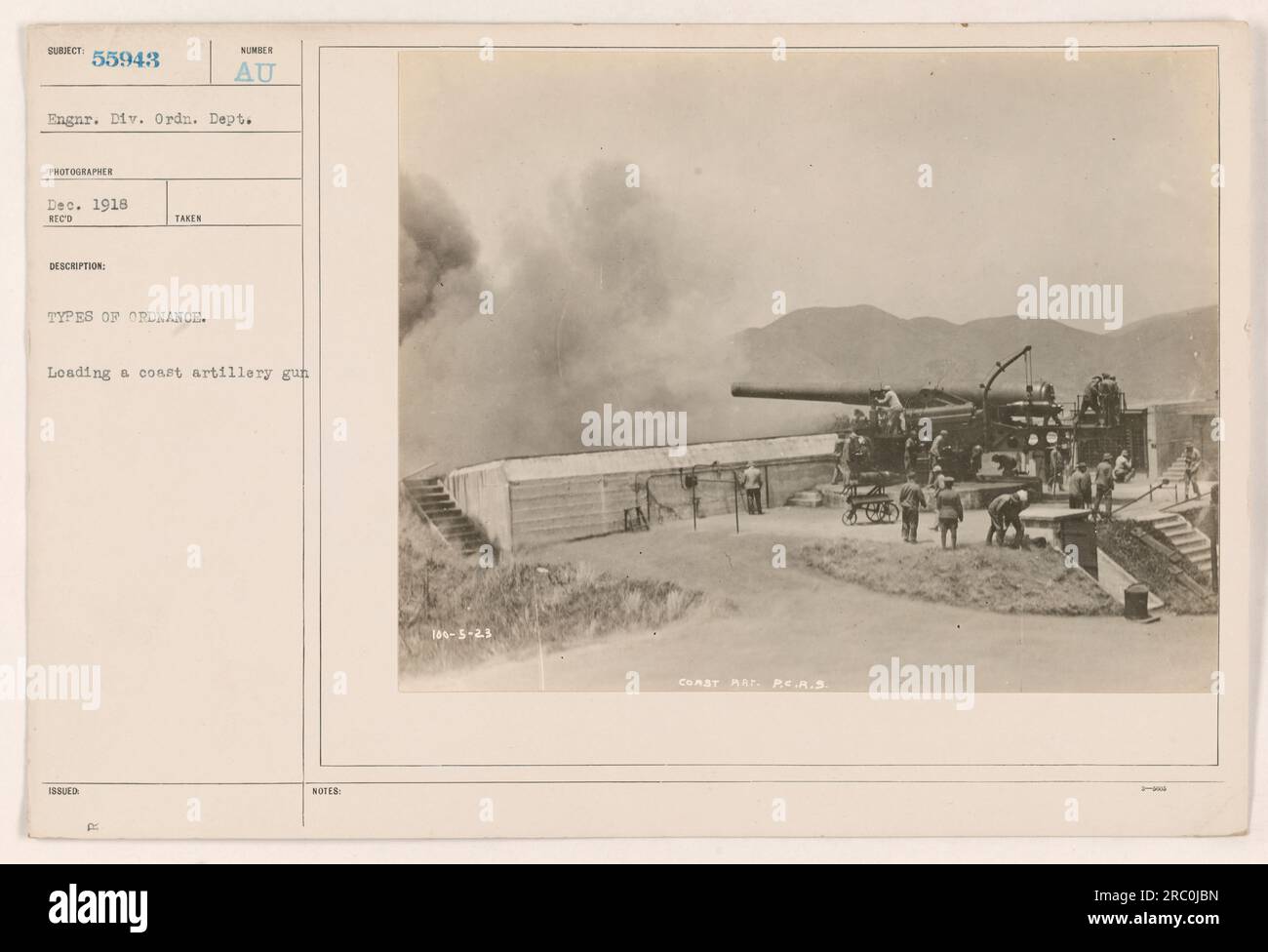 Coast artillery personnel loading a coastal artillery gun during World War One. The photograph ...