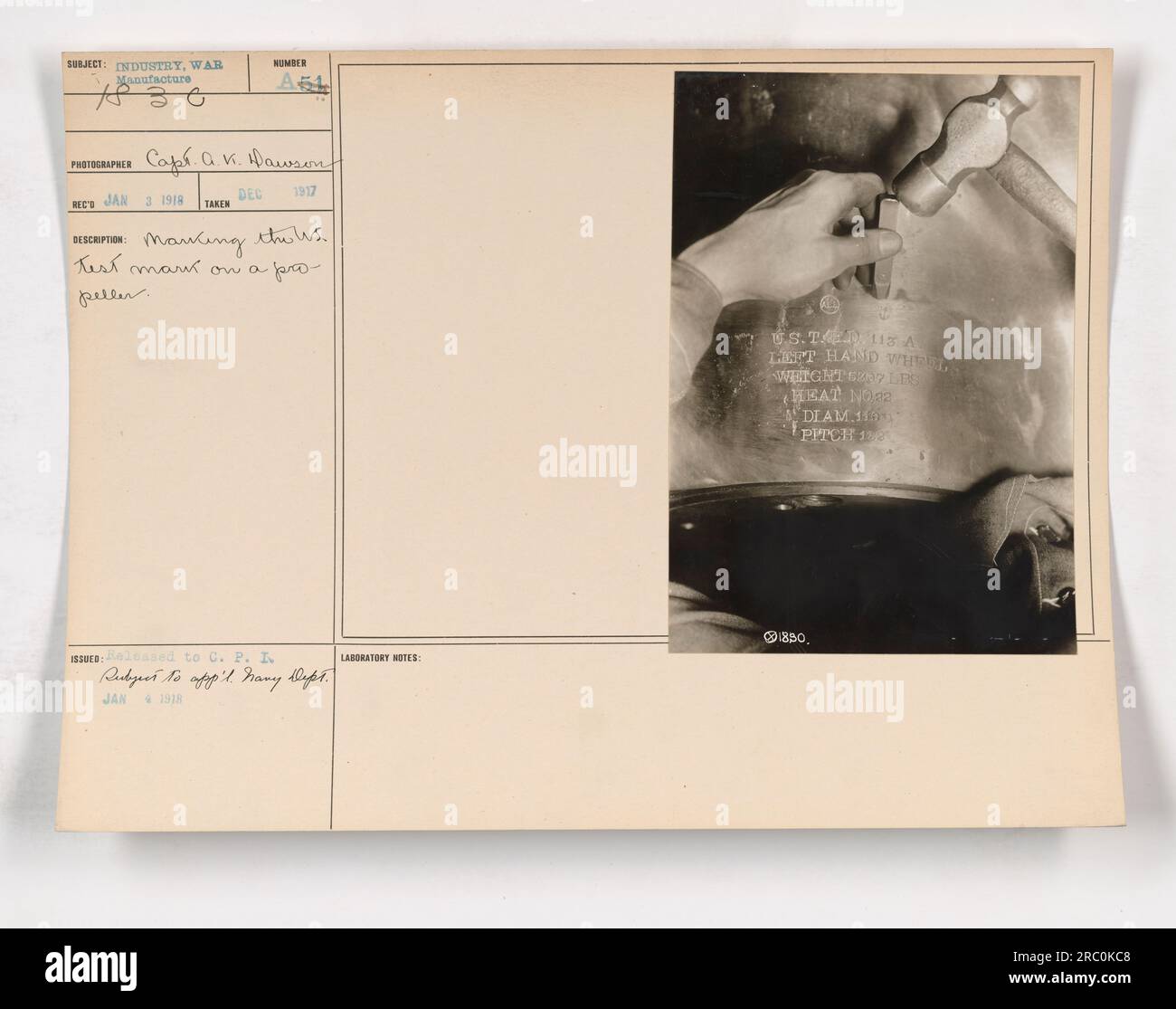 U.S. soldier marking the U.S. test mark on a propeller at a ...
