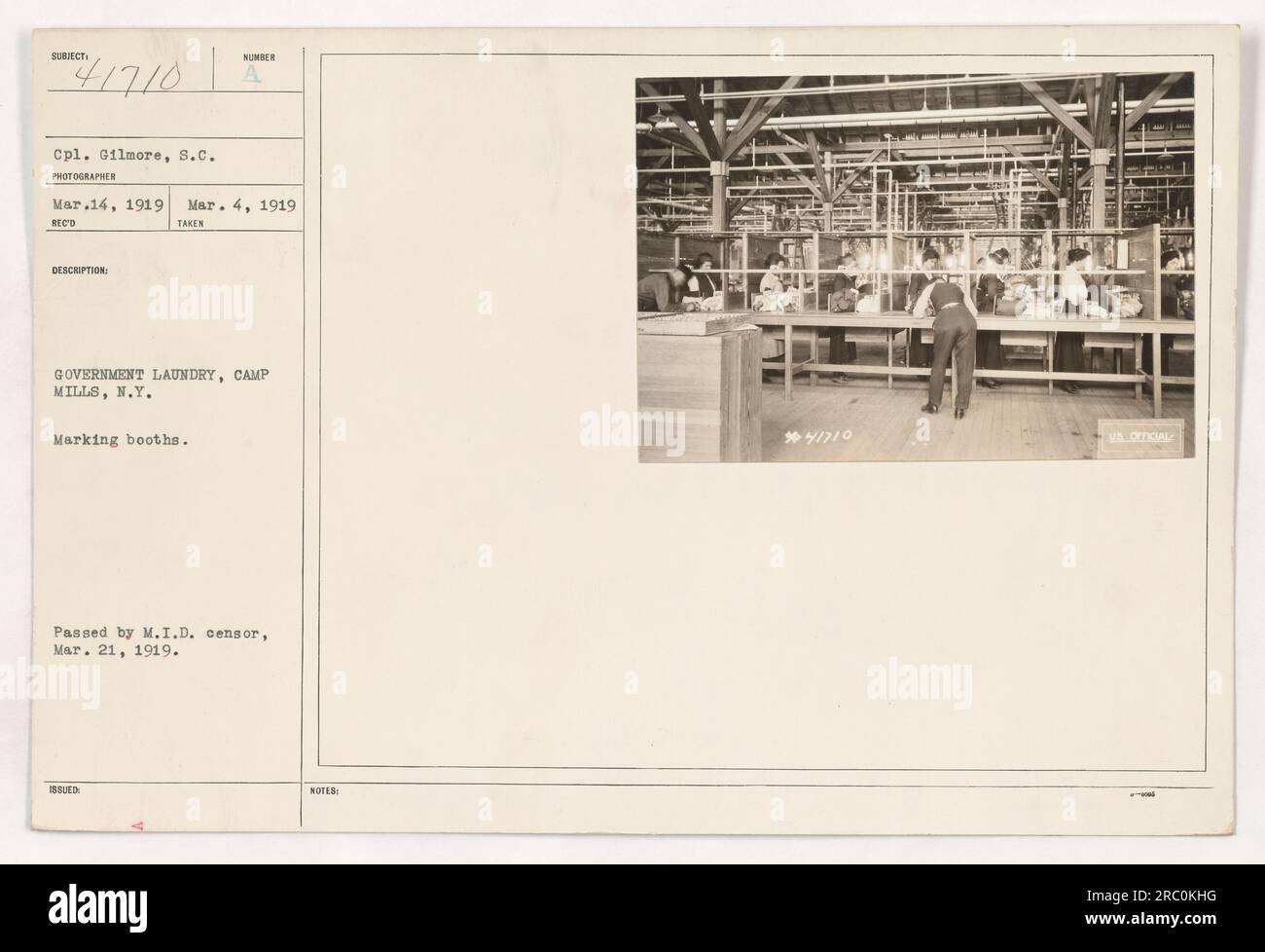 "Cpl. Gilmore at the government laundry in Camp Mills, N.Y. preparing ...