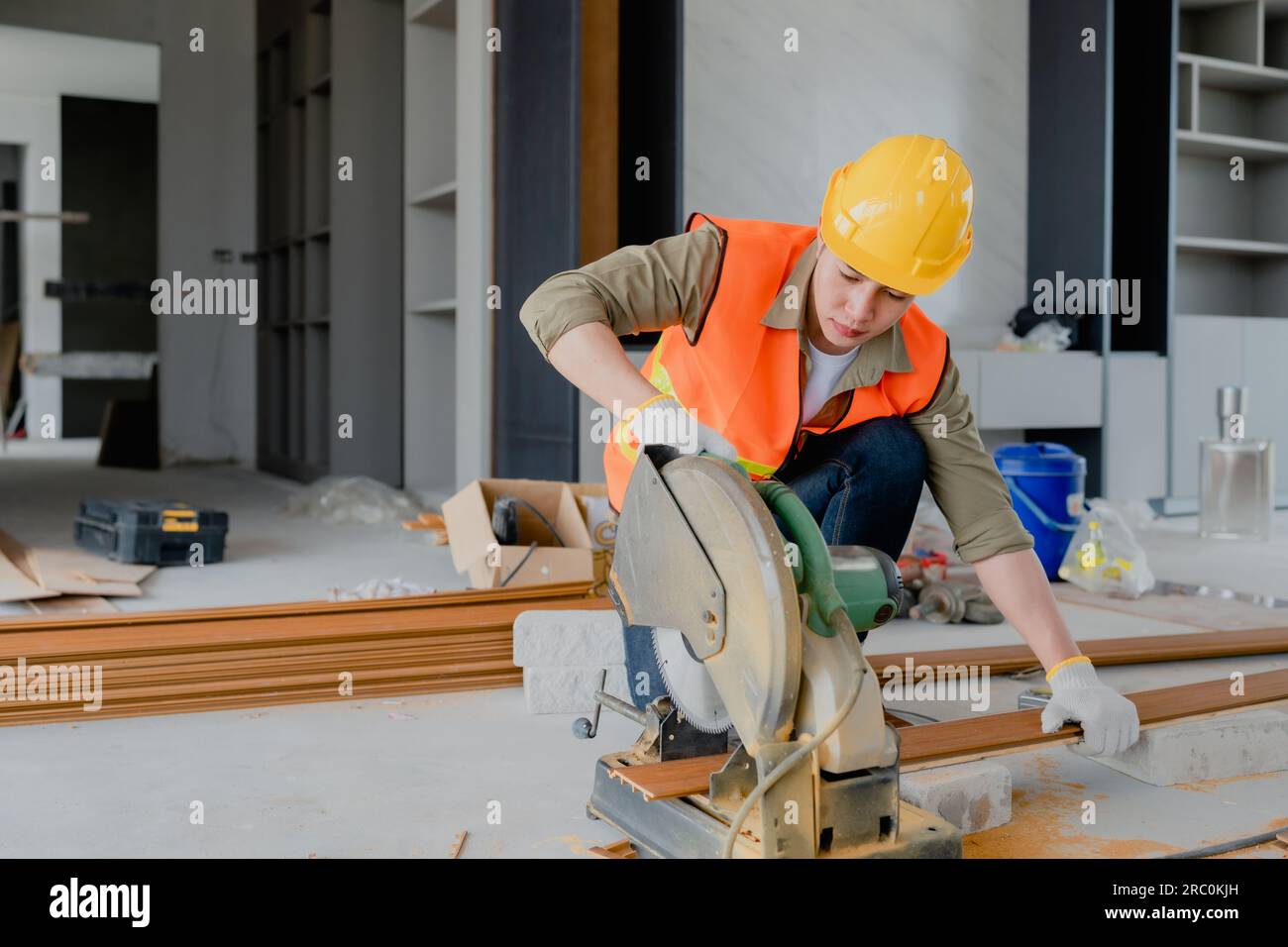 Structural worker dressed in safety gear and hard hat doing ...