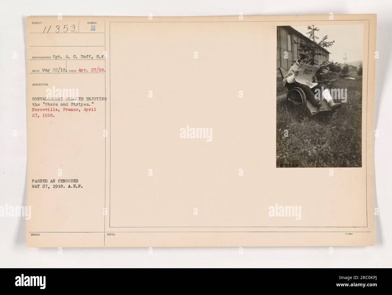 Convalescent soldier reading the "Stars and Stripes" newspaper in ...