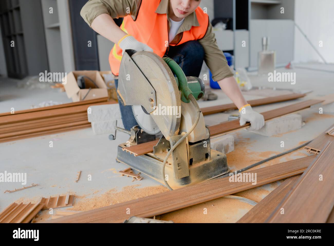 Structural worker dressed in safety gear and hard hat doing ...