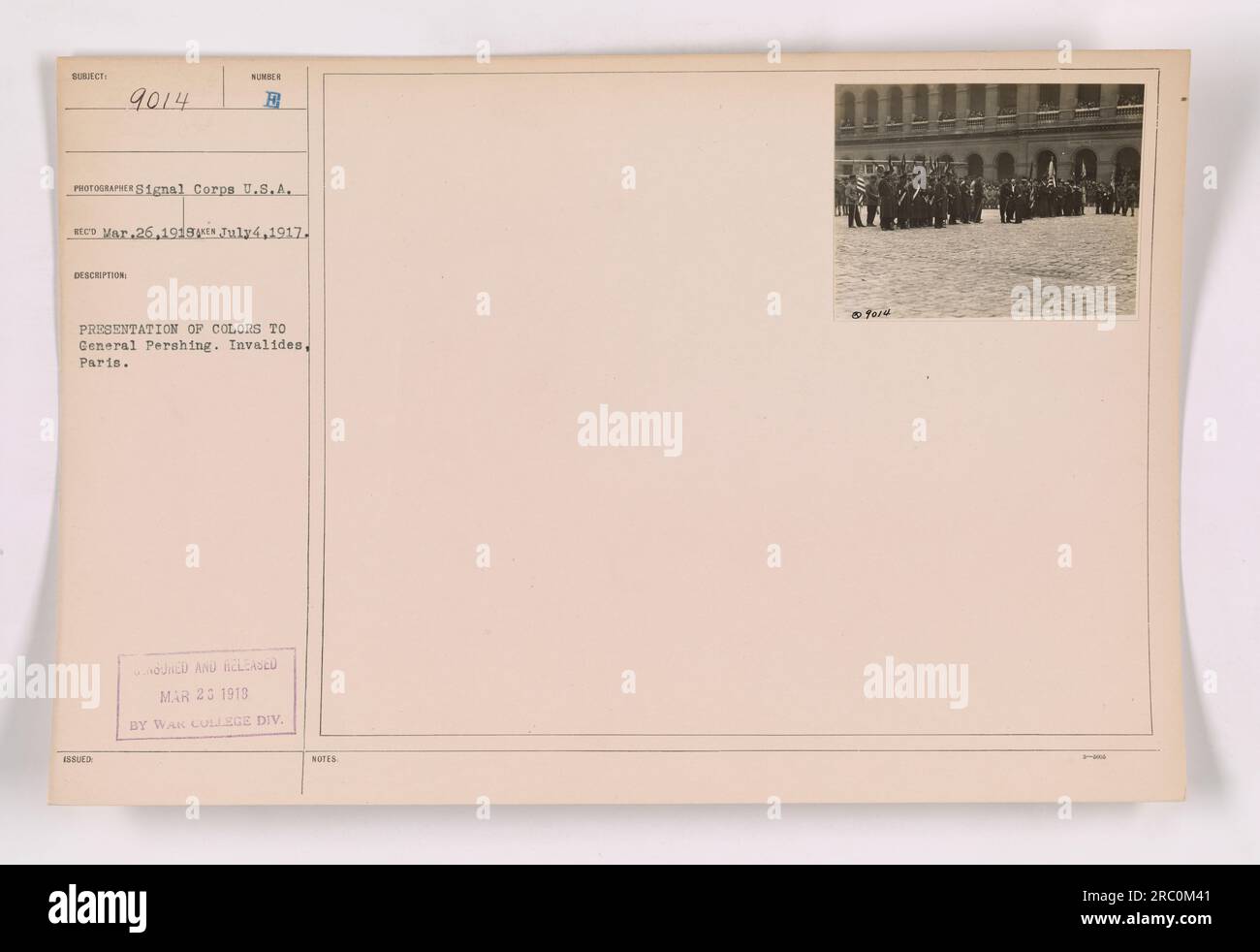 The photograph shows the presentation of colors to General Pershing at ...