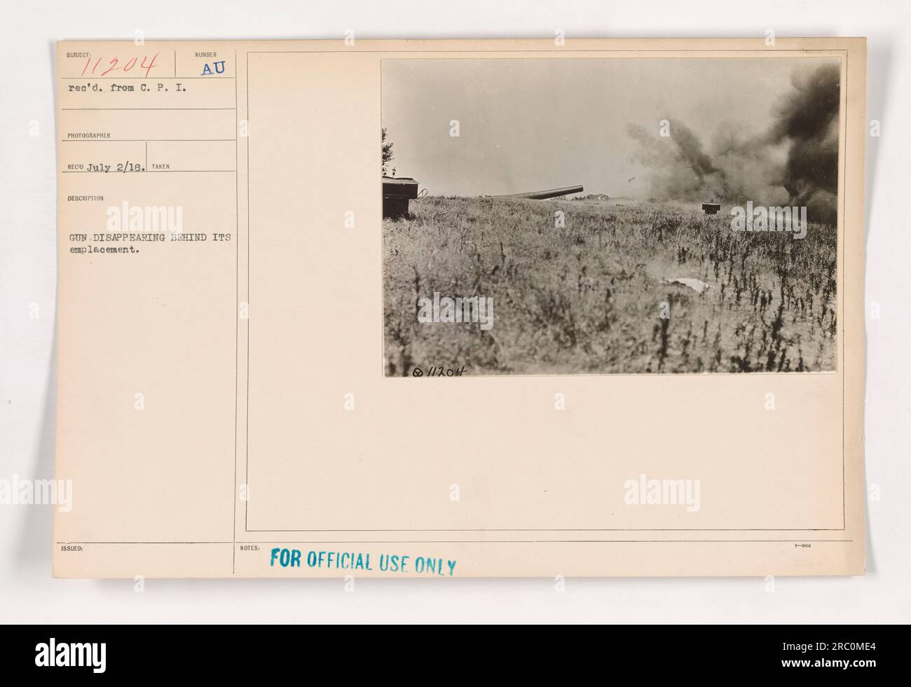 Soldiers operating a field artillery cannon during World War One. The ...