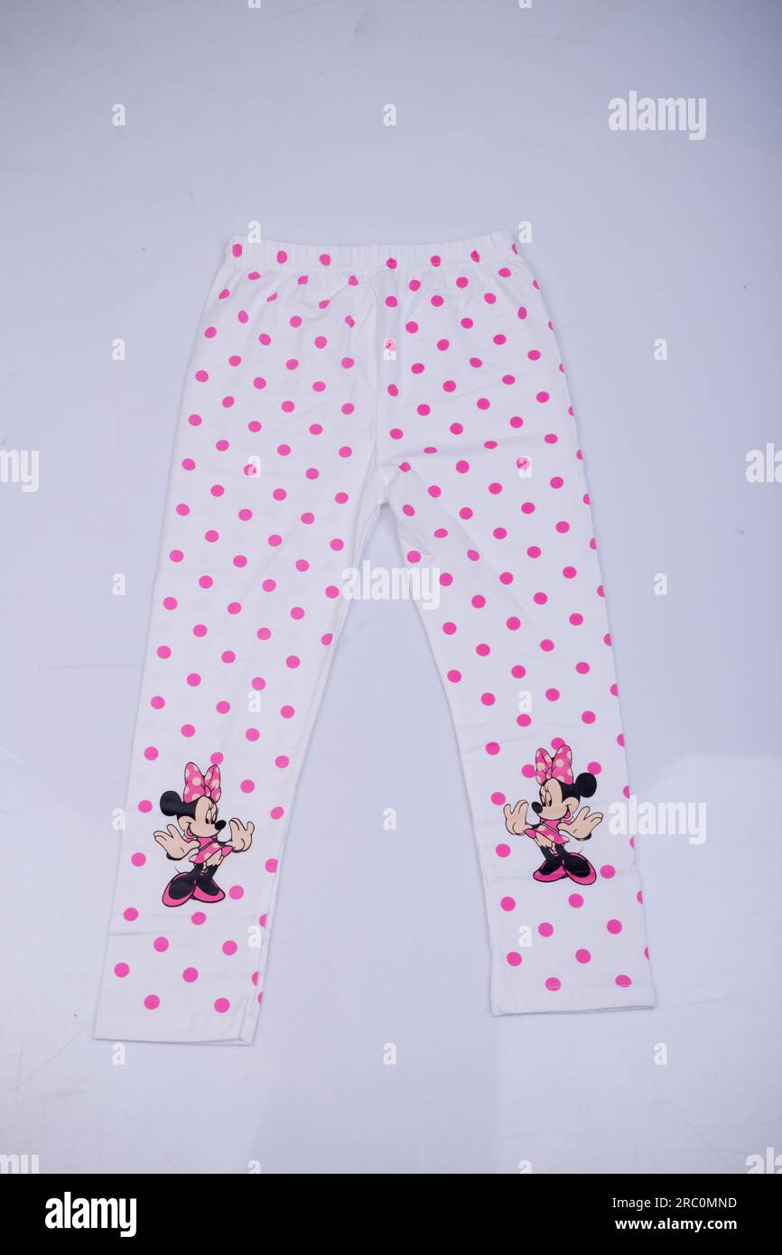 Clothe cloth small kids children outfits display Stock Photo - Alamy