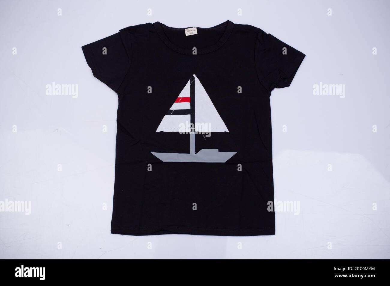 Clothe cloth small kids children outfits display Stock Photo - Alamy