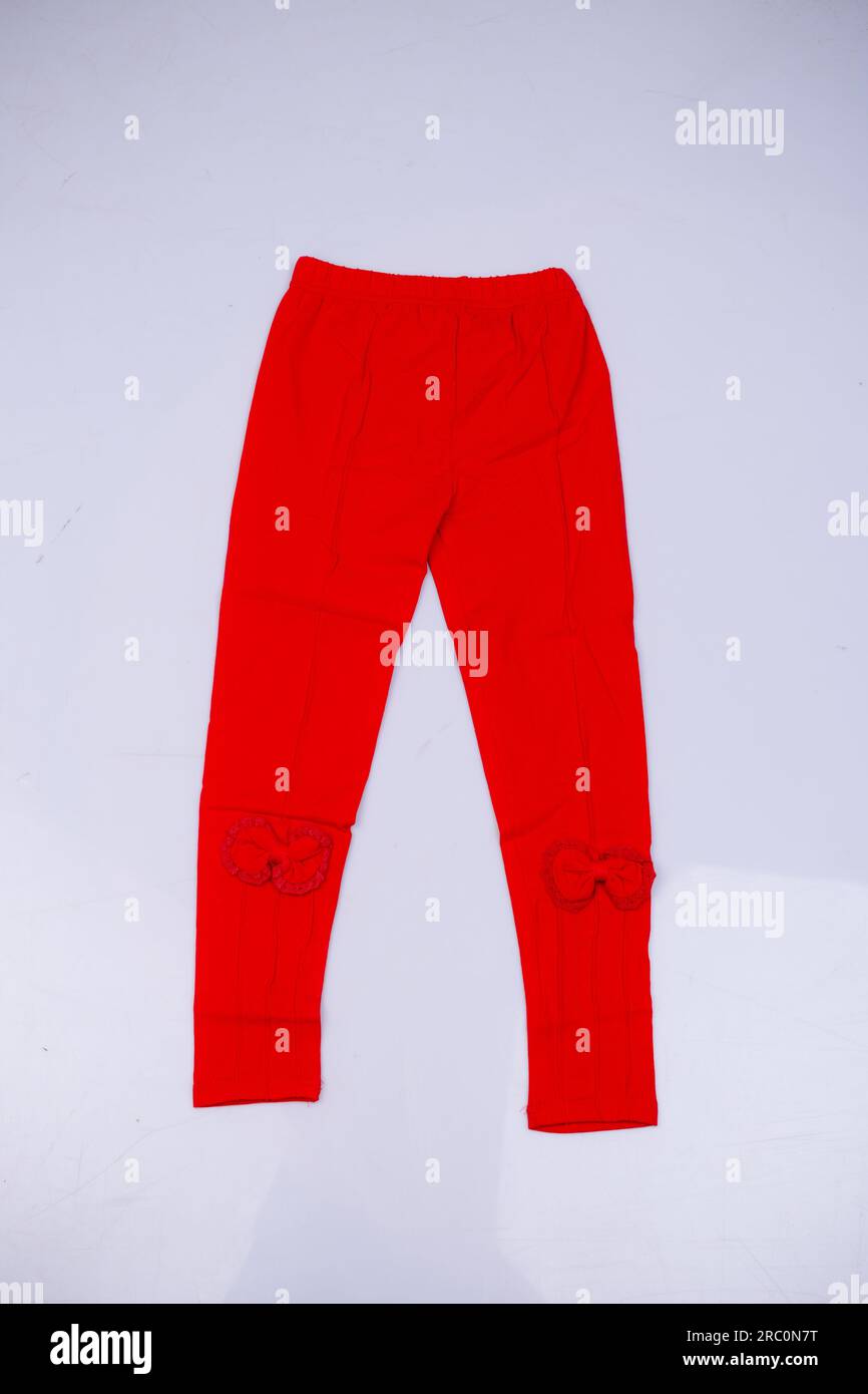 Clothe cloth small kids children outfits display Stock Photo - Alamy