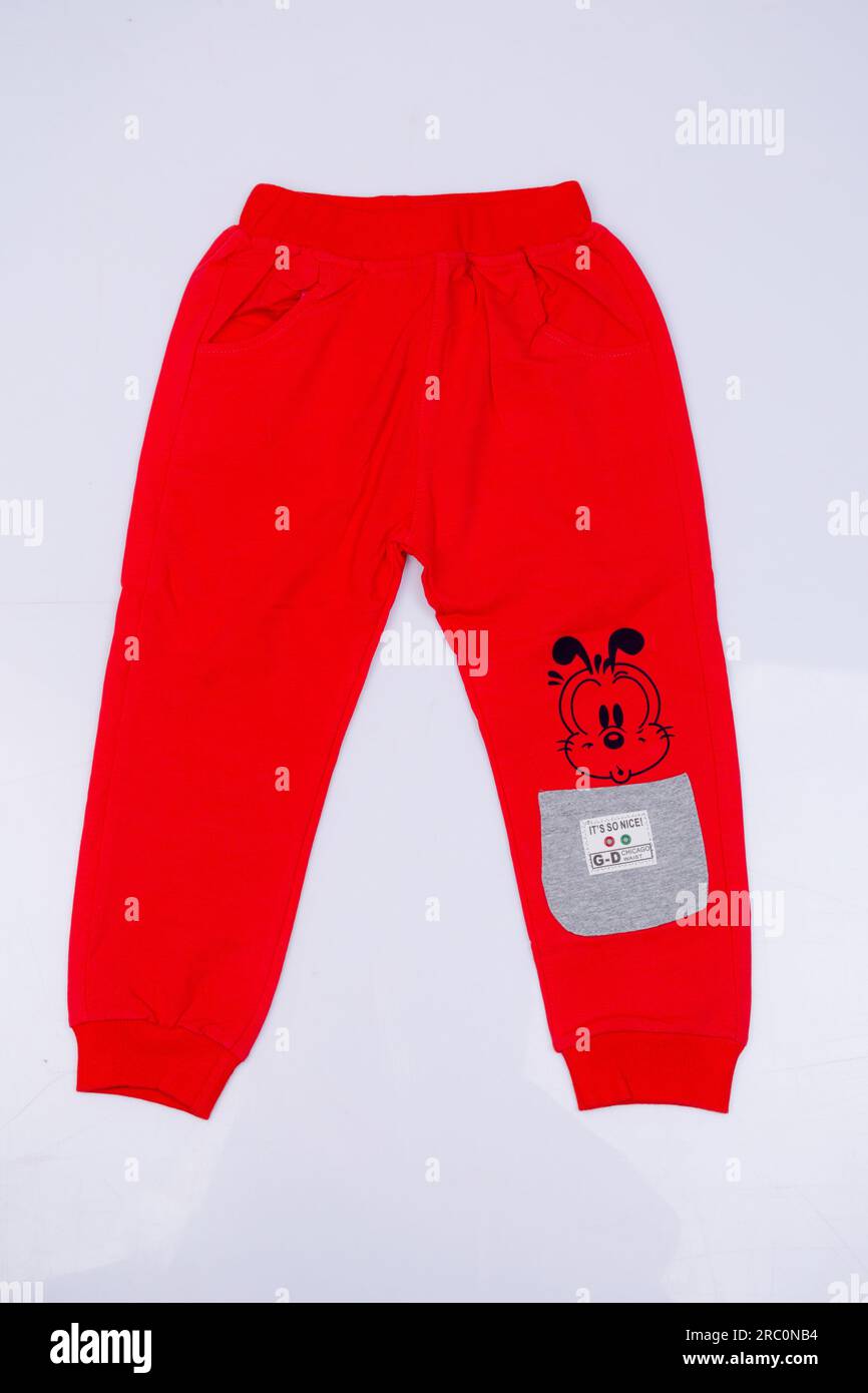 Clothe cloth small kids children outfits display Stock Photo - Alamy