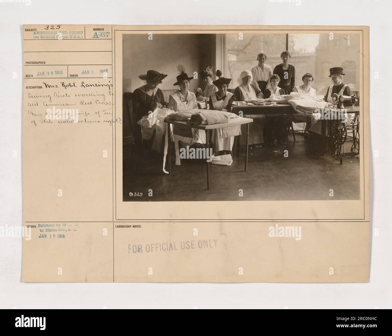 Mrs. Robert Lansing's sewing circle, including Mrs. Lansing herself and ...
