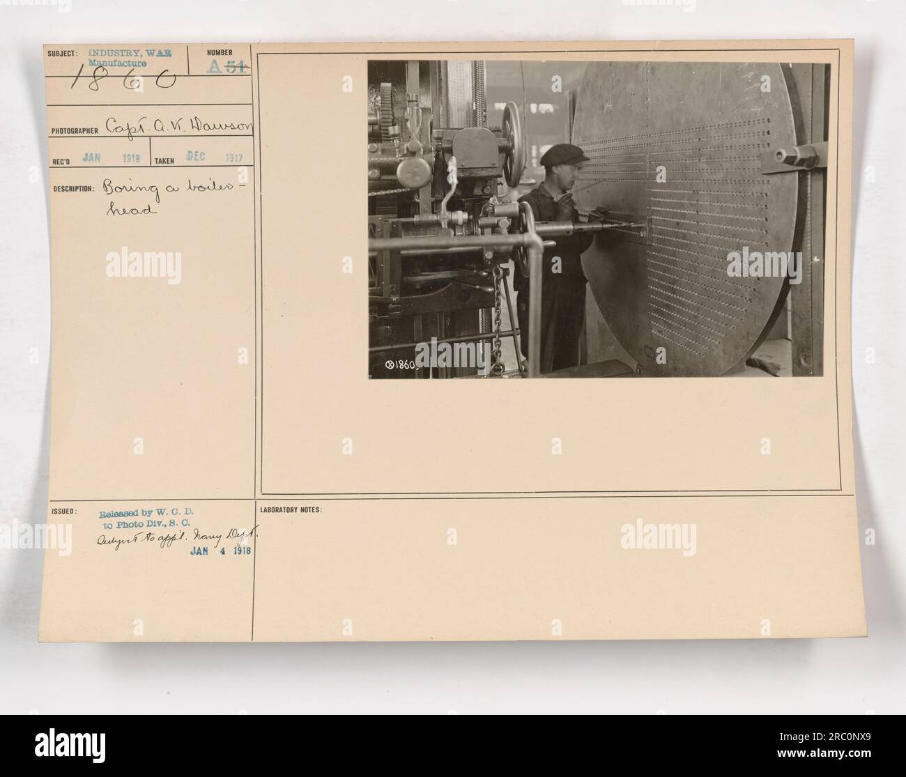 A worker bored a boiler-head as part of the manufacturing process ...