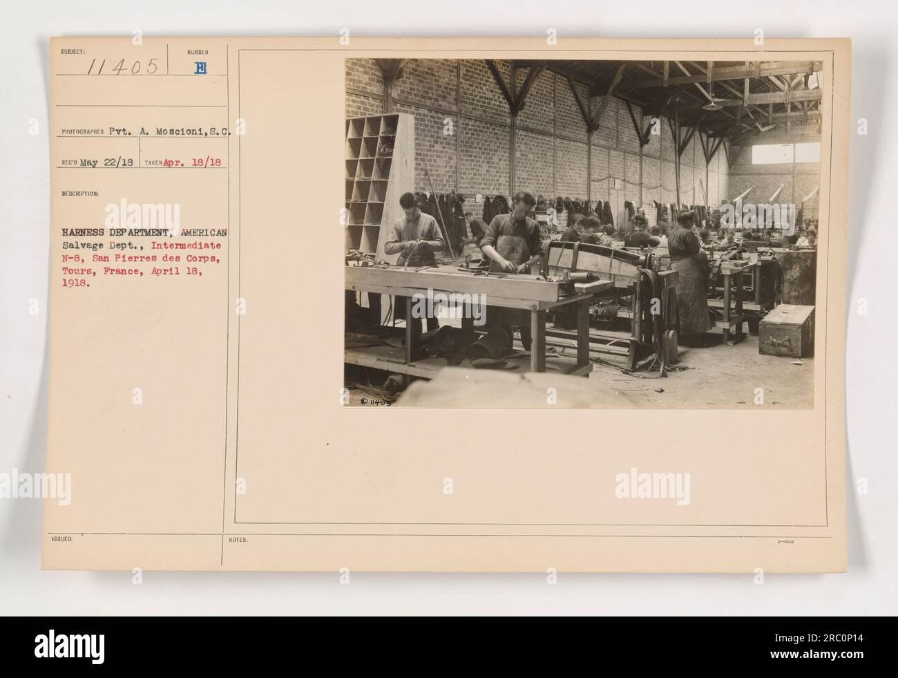 Soldiers working in the harness department of the American Salvage ...