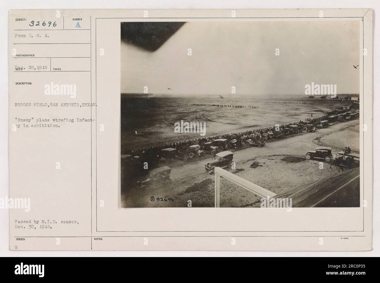 An "enemy" plane strafes infantry in an exhibition at Brooks Field, San ...