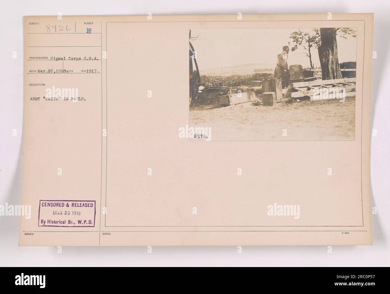 Army soldier, identified as "Smith," photographed in the field during ...