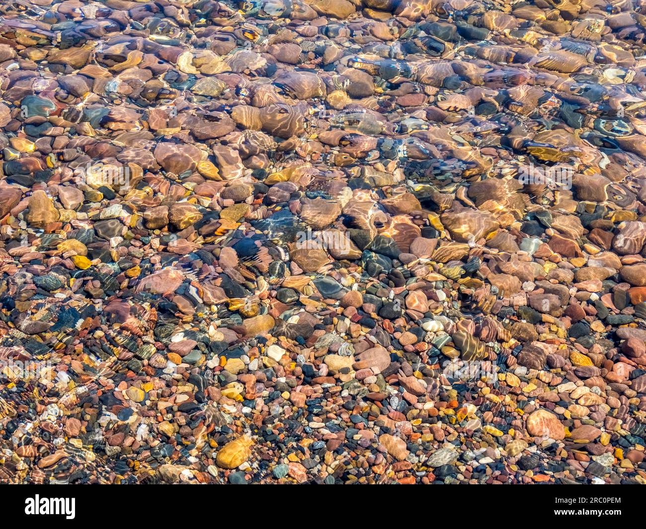 Small colorful rocks under the water hi-res stock photography and ...