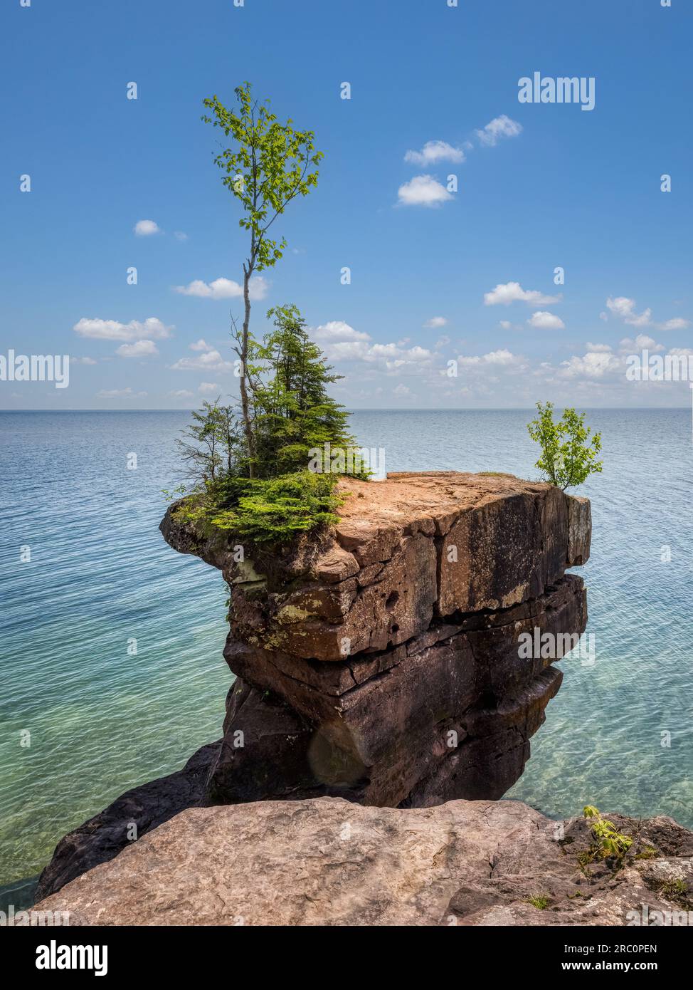 Rocky coastline of Lake Superior in Big Bay State Park in La Pointe on ...