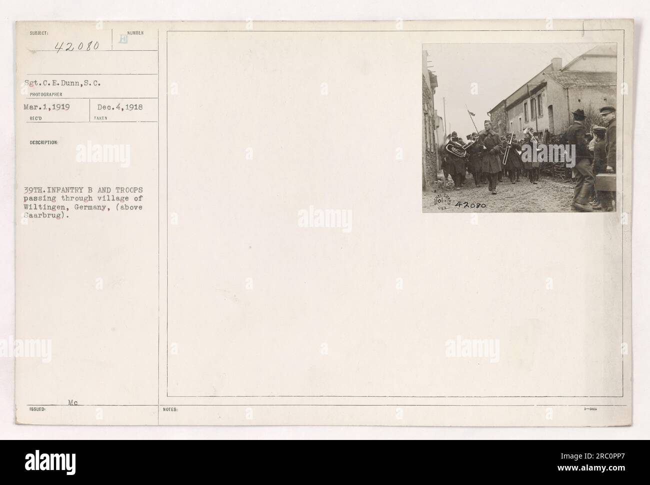 American troops from the 39th Infantry Battalion pass through the ...