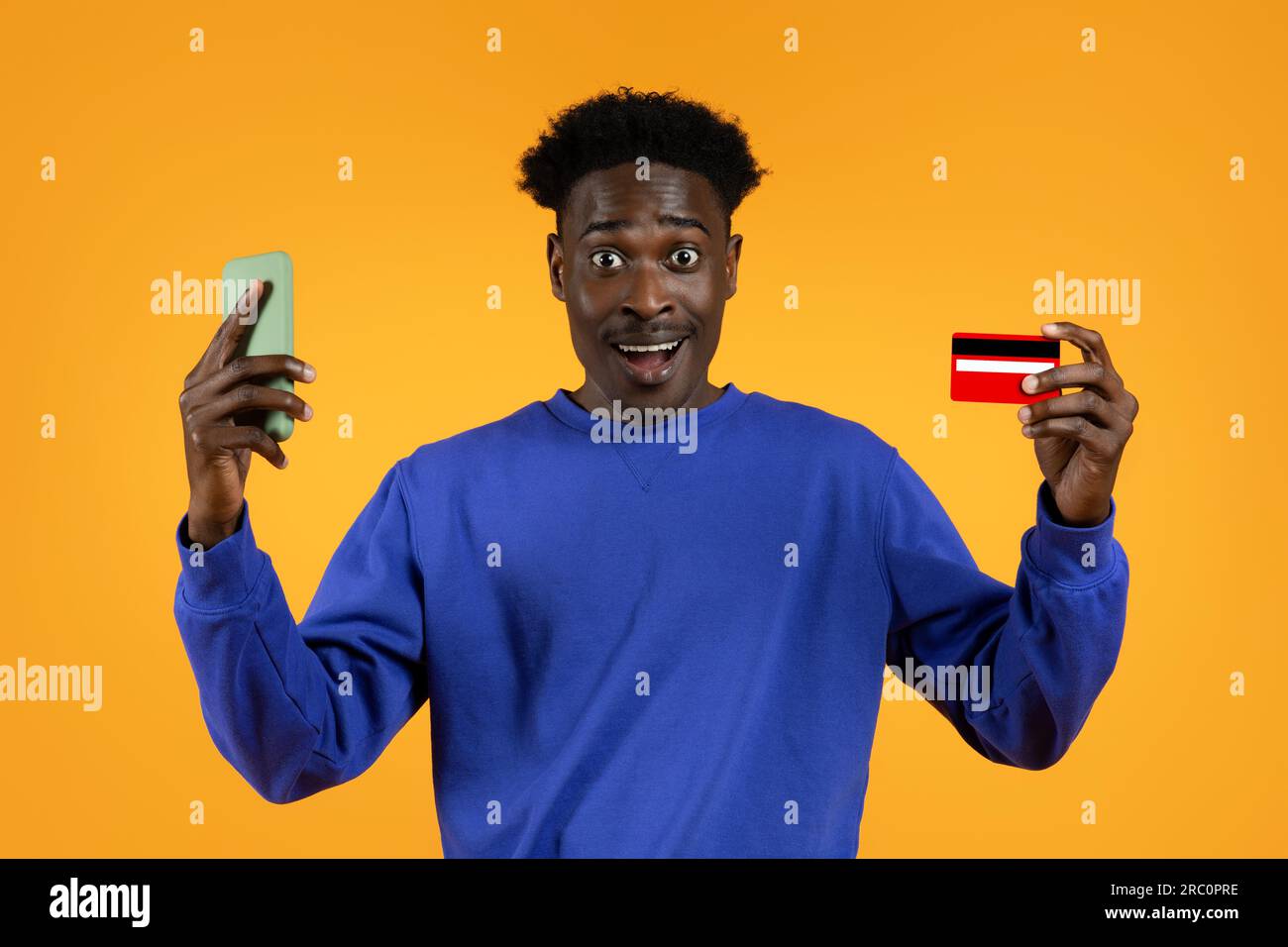 Young man bank card hi-res stock photography and images - Alamy