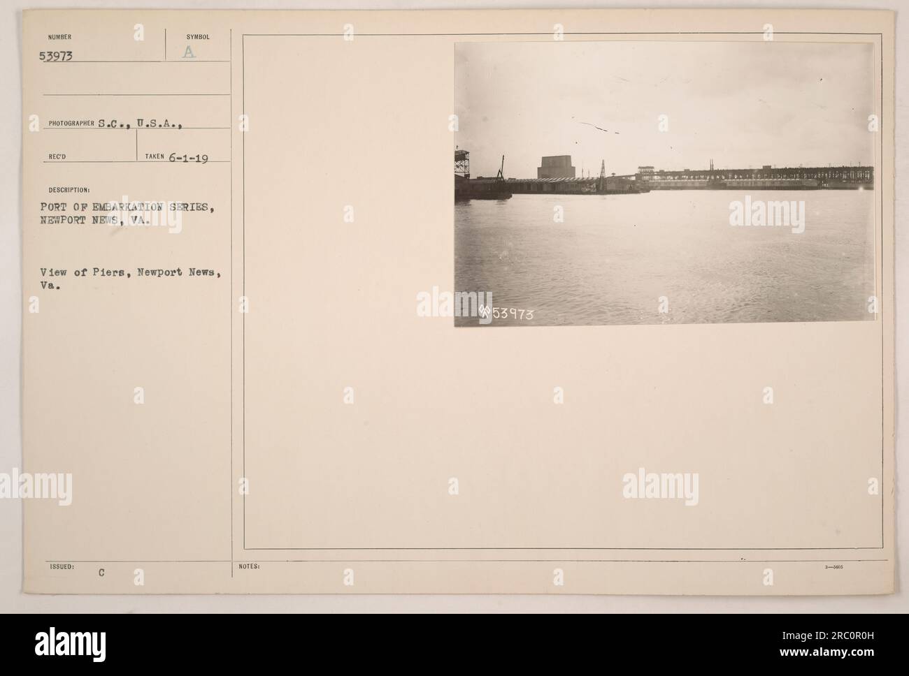 This image shows a view of the piers in Newport News, Virginia during ...