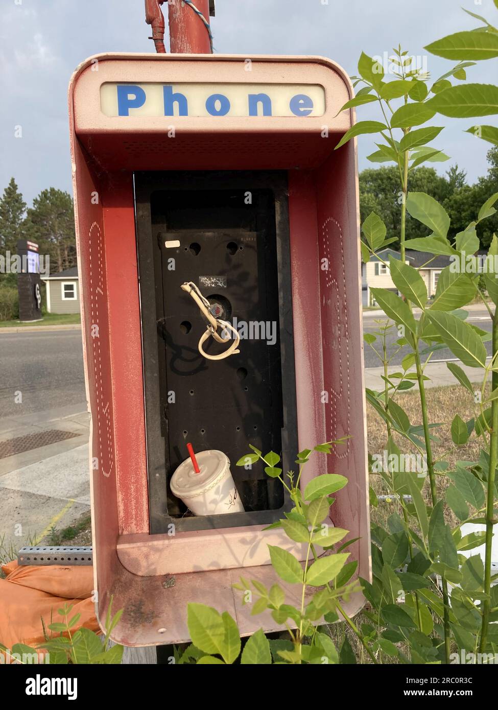 abandoned public phone Stock Photo - Alamy